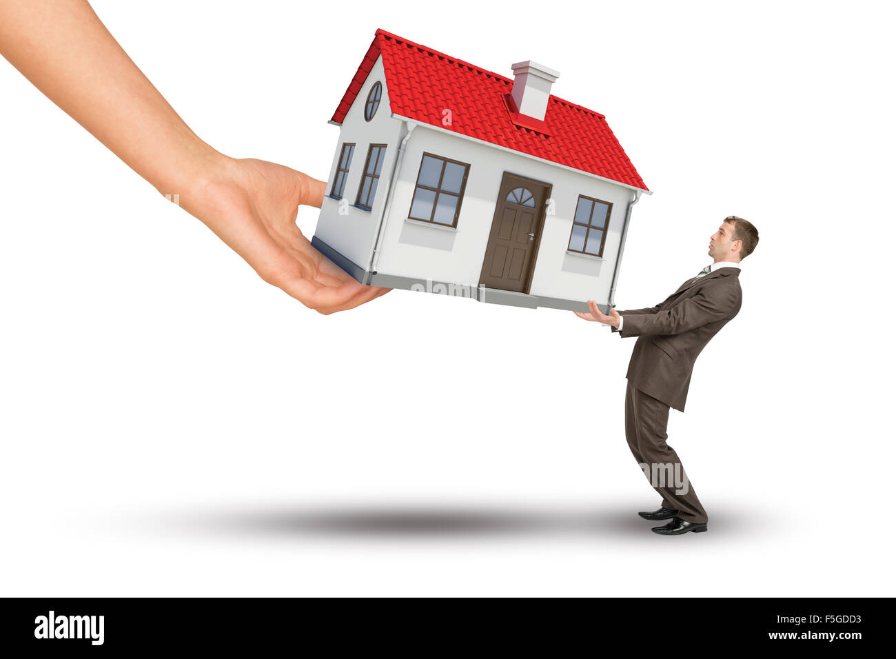 Hand giving house to businessman Stock Photo - Alamy