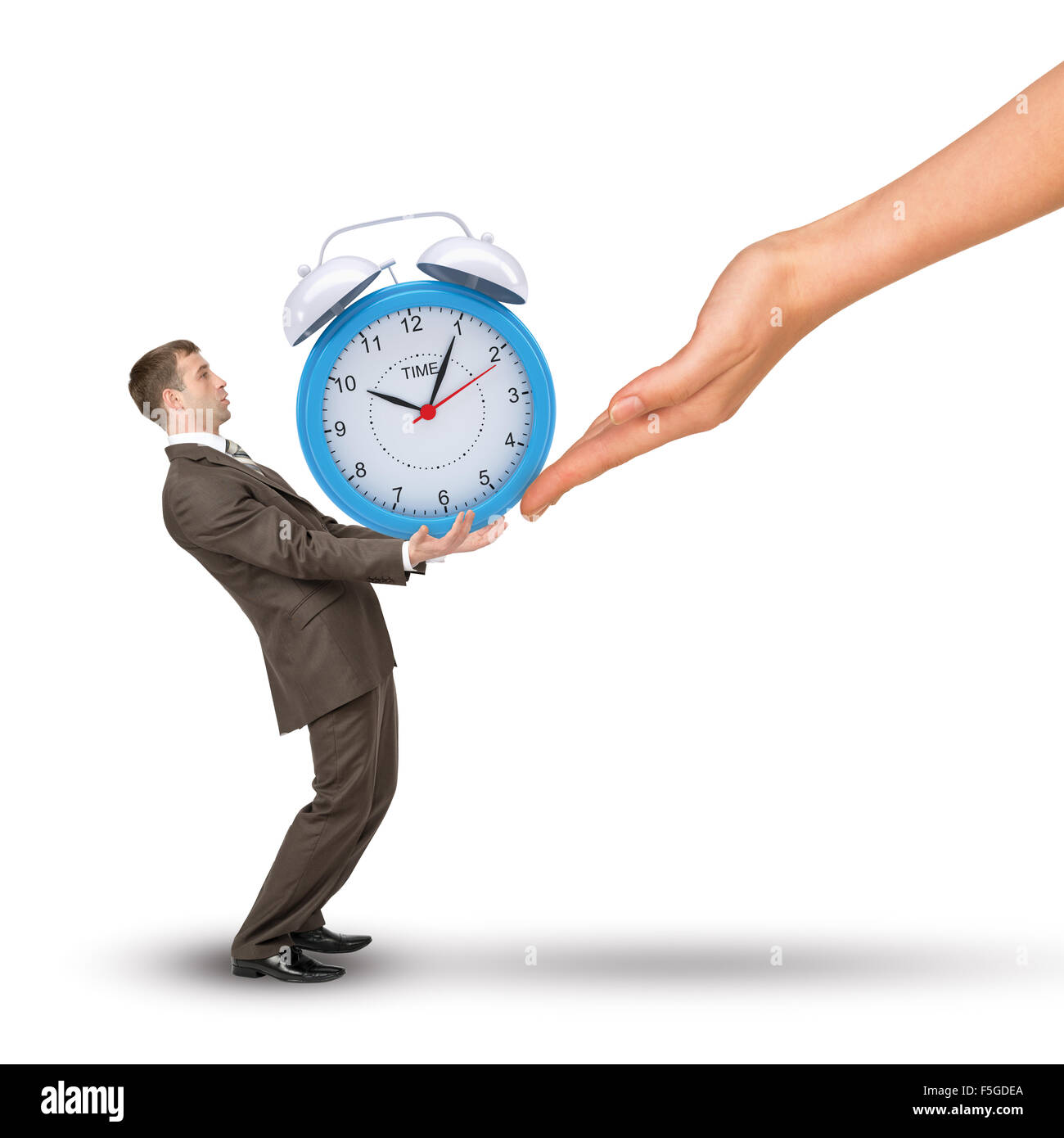 Hand giving alarm clock to businessman Stock Photo - Alamy