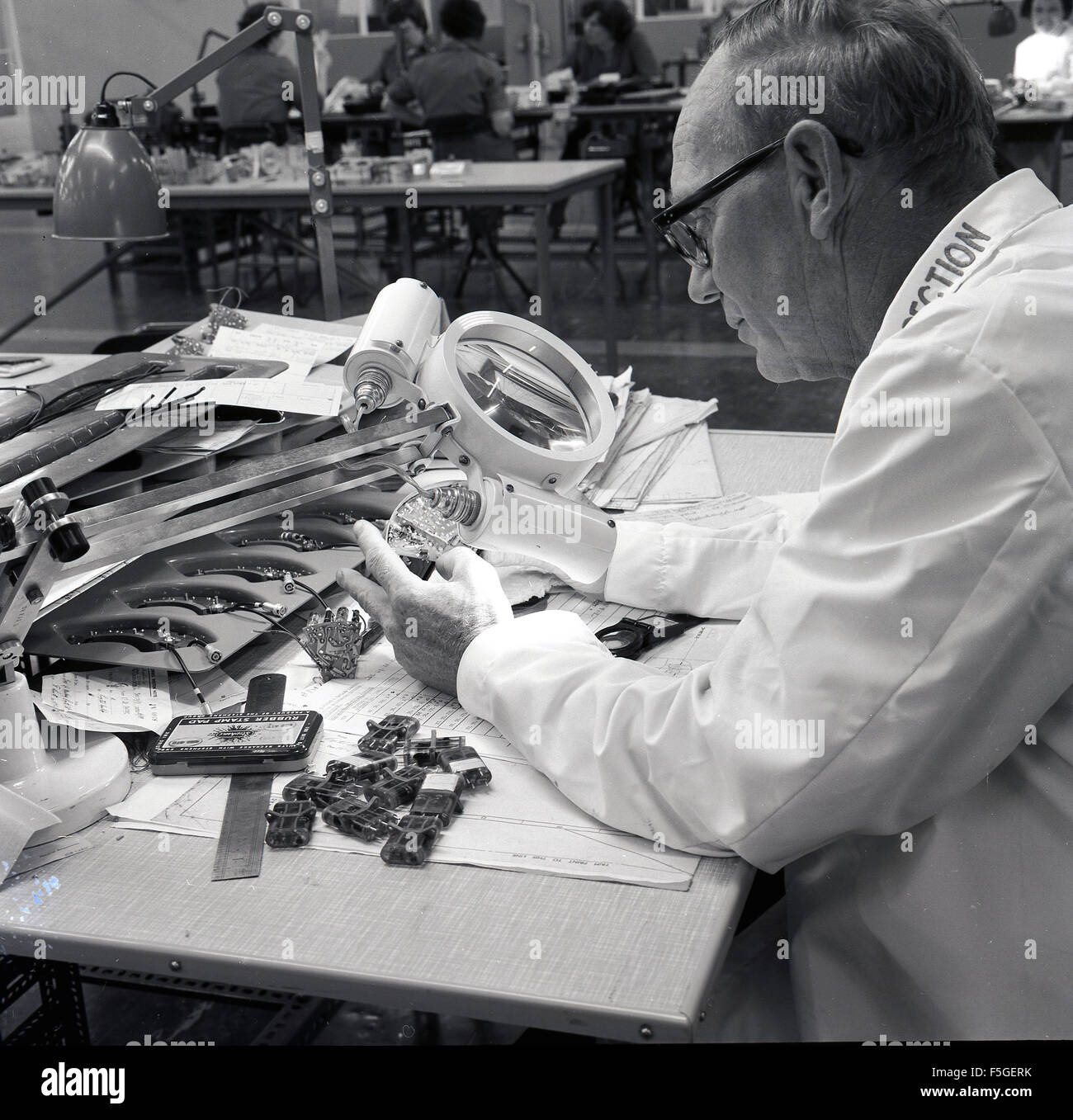 historical, 1950s, industry, white coated factory inspector at work ...