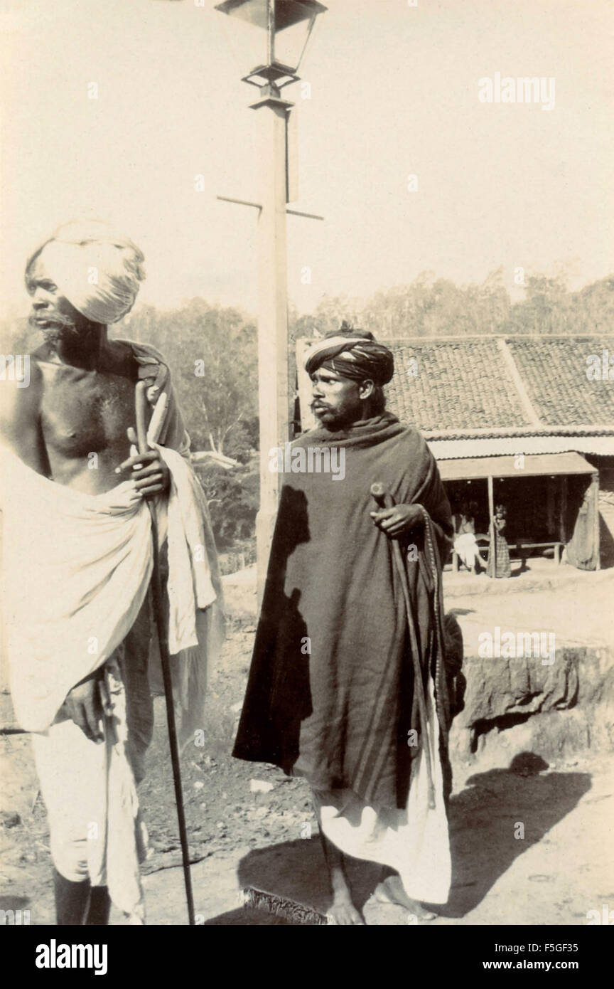 Two Indians with sticks, India Stock Photo - Alamy