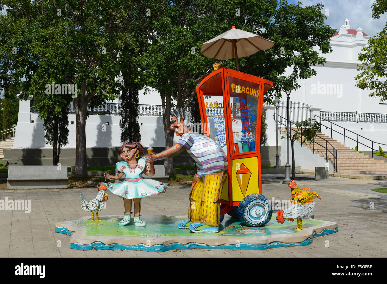 Sculpture of a piraguas vendor in the plaza of Coamo, Puerto Rico ...