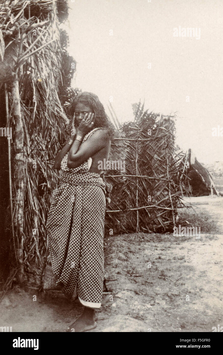 A woman outside the hut , India Stock Photo - Alamy