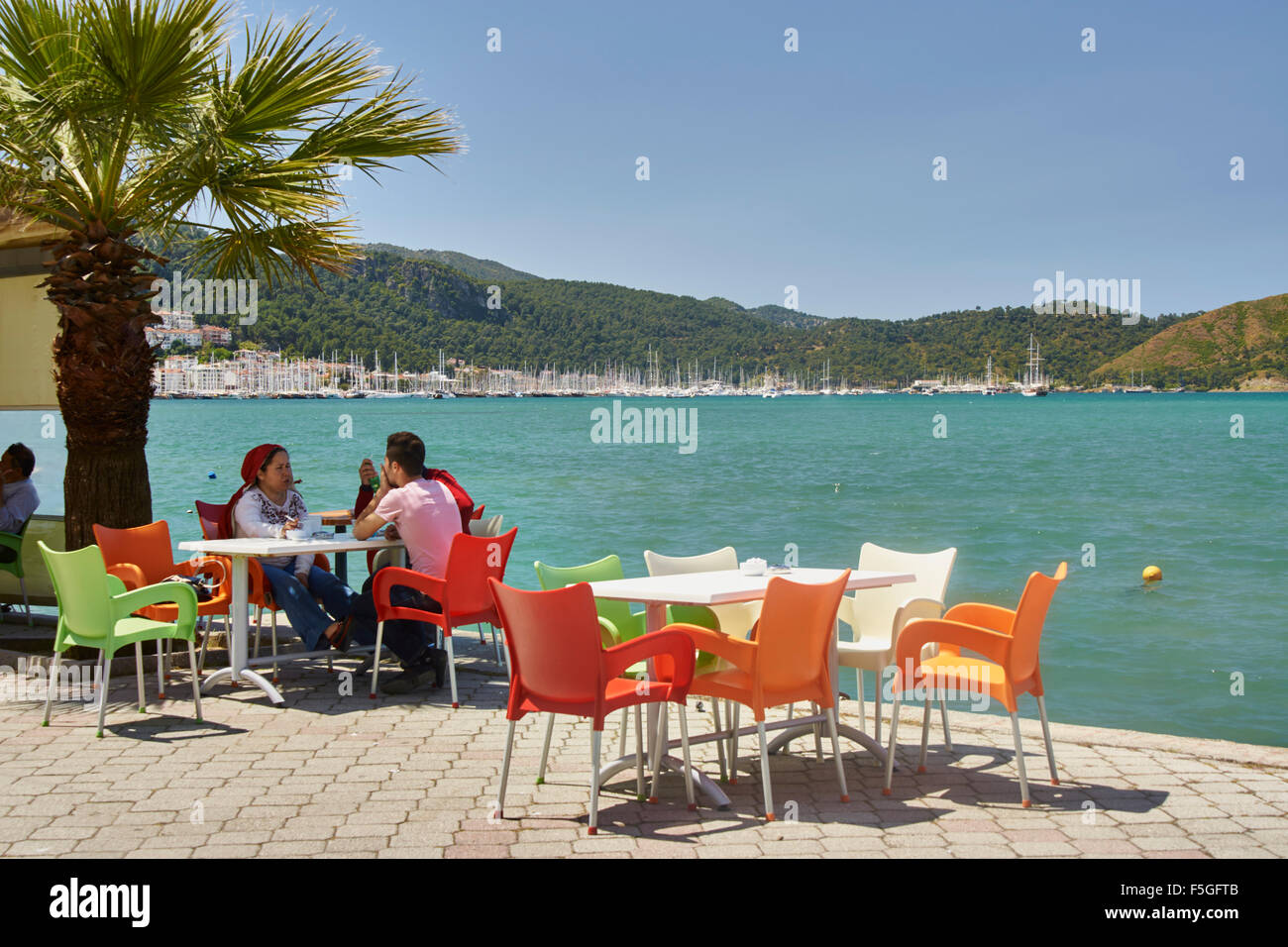 Out door drinking and smoking area by sea front Stock Photo - Alamy