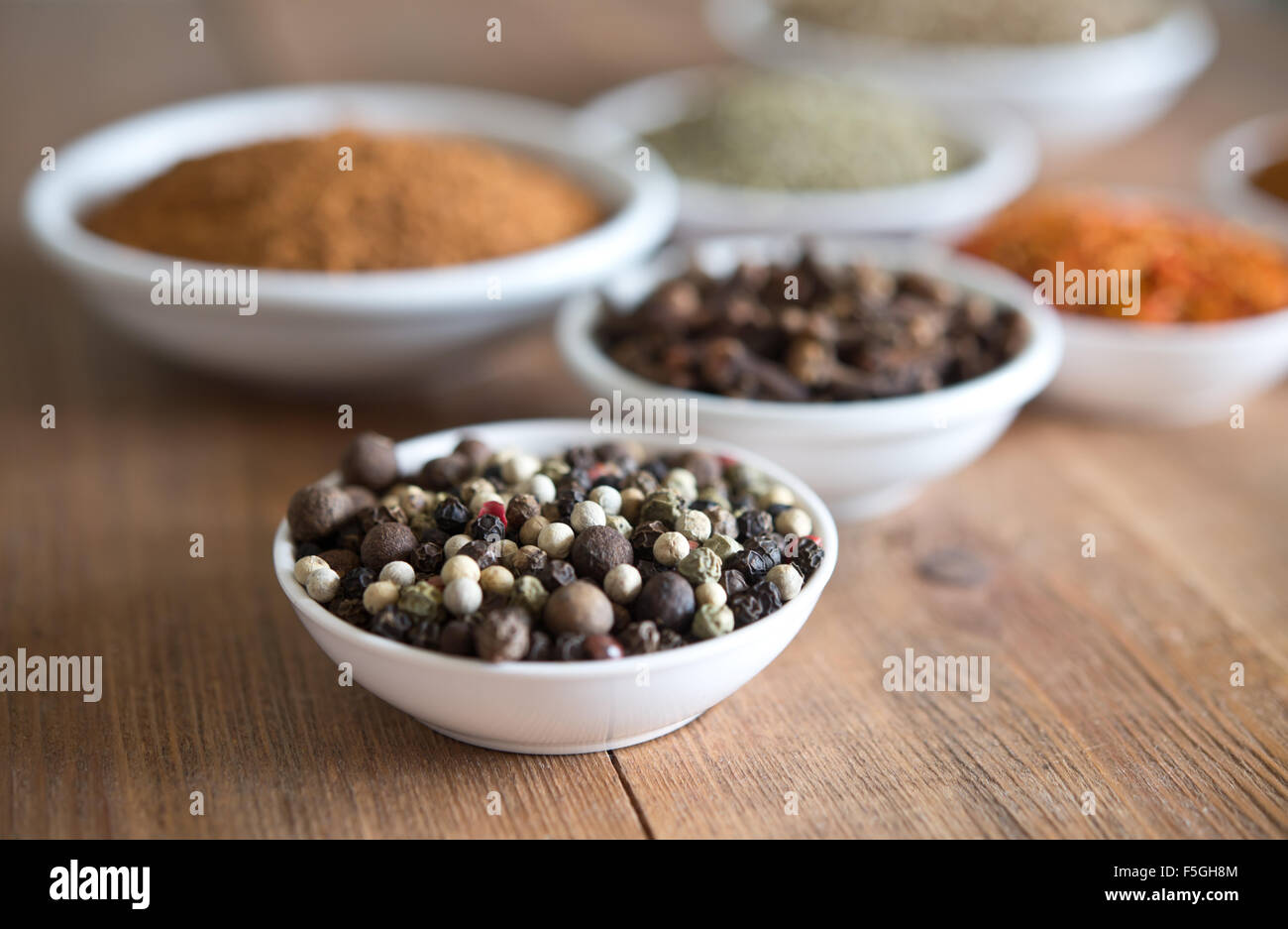 various spices on wooden table Stock Photo - Alamy