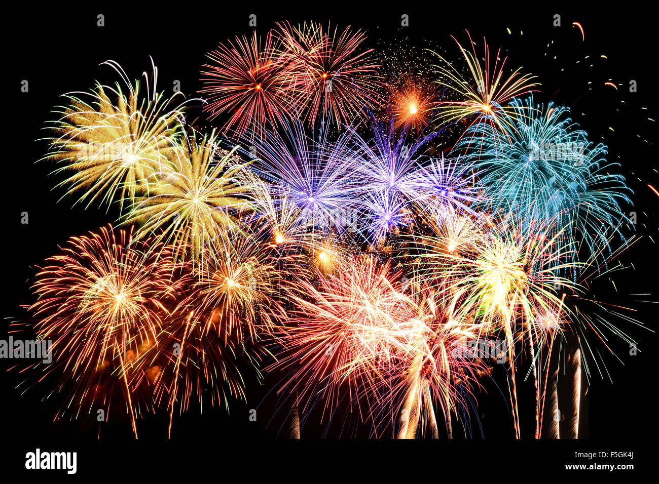 Different colorful fireworks exploding display hi-res stock photography ...