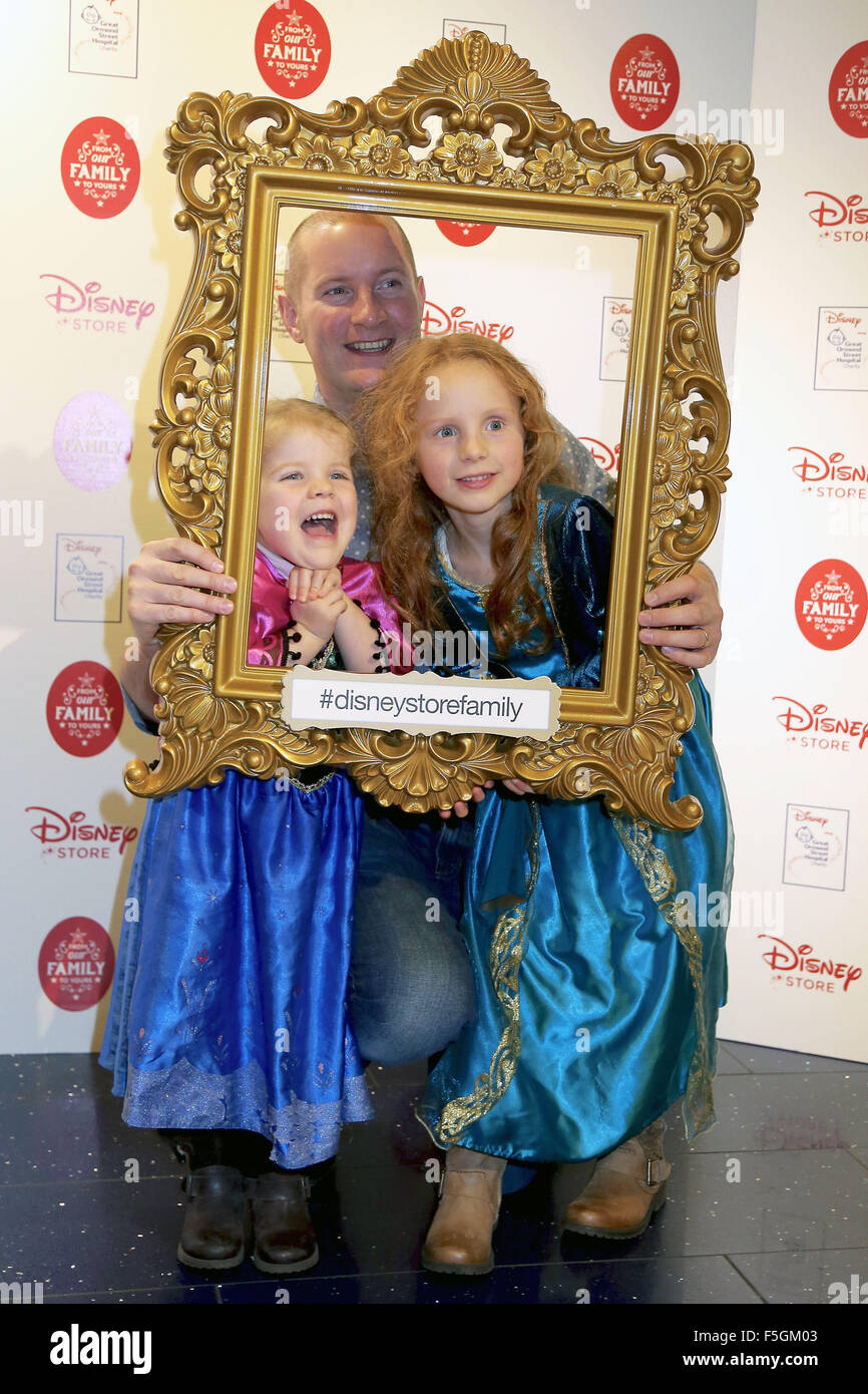 London, UK. Richard Burr and daughters at the Disney 'From Our Family ...