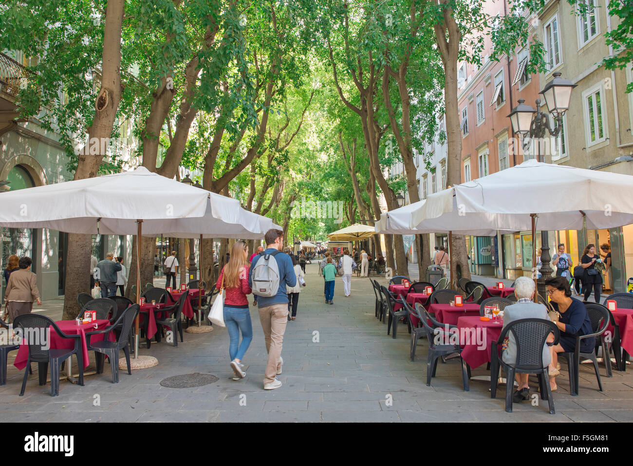 Trieste cafe, people relax in the the Viale XX Settembre, a long Stock ...