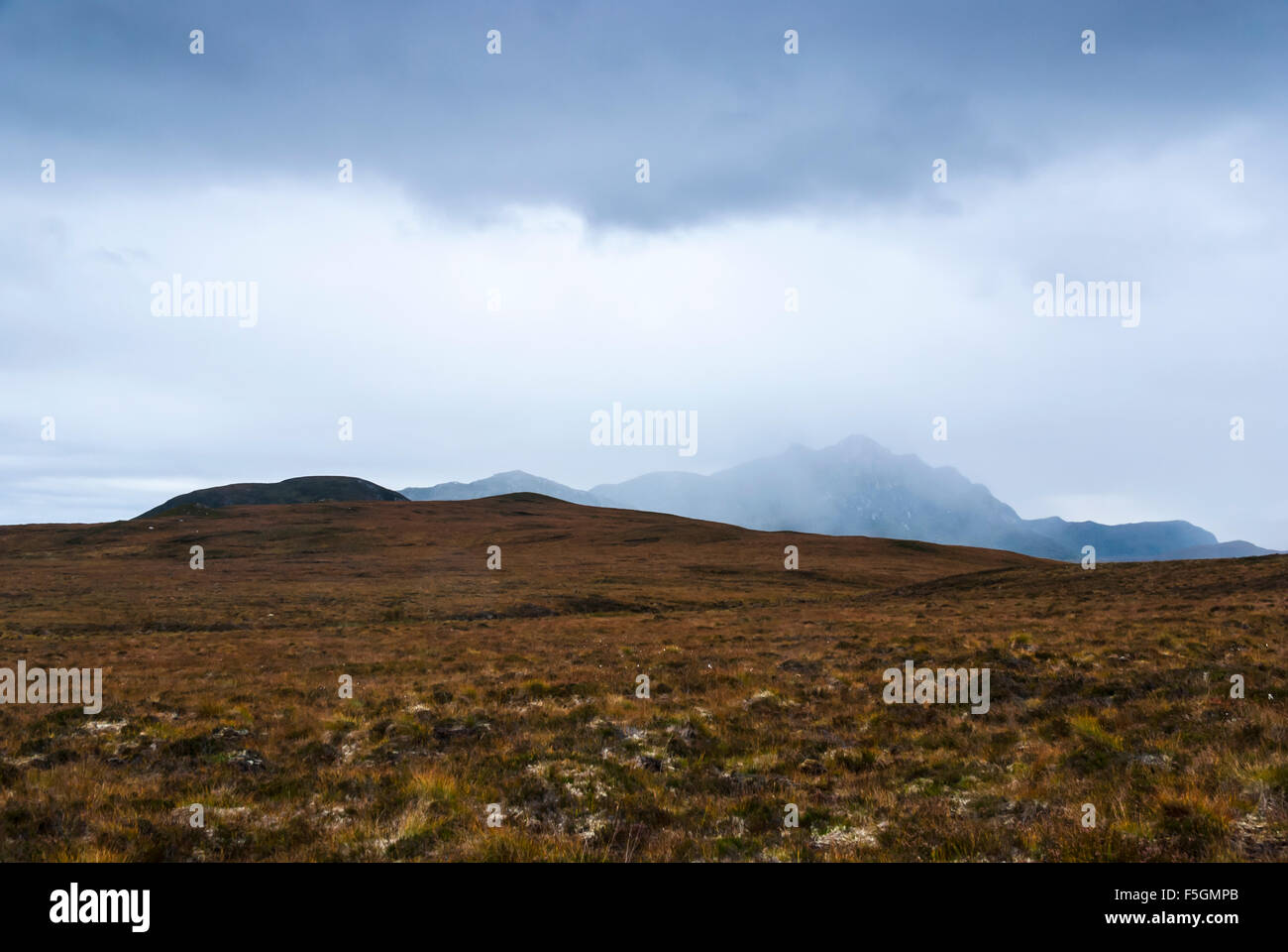A rain squall over Ben Loyal, Beinn Laghail, Sutherland, Scotland Stock ...