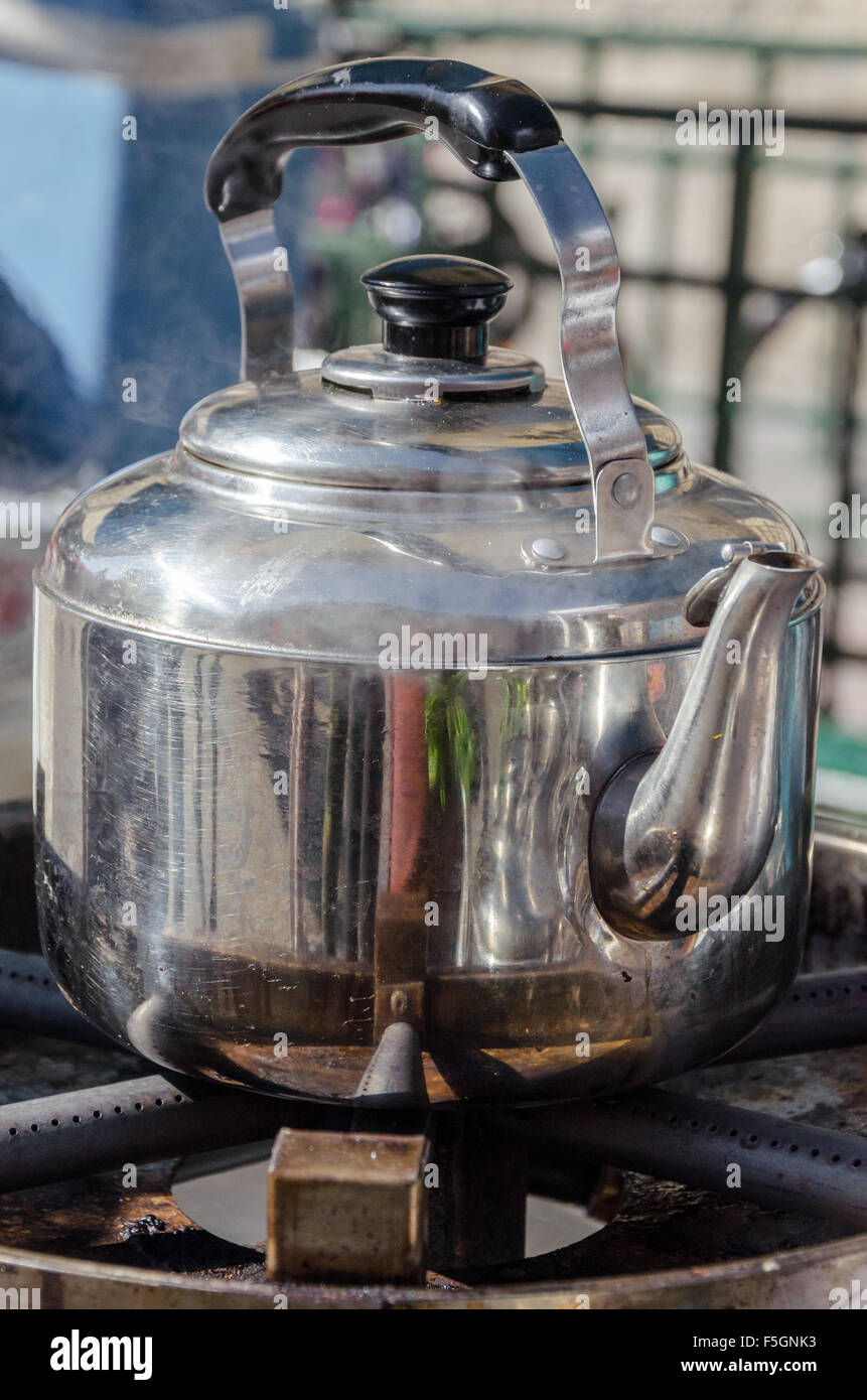 A hot metallic tea kettle Stock Photo - Alamy