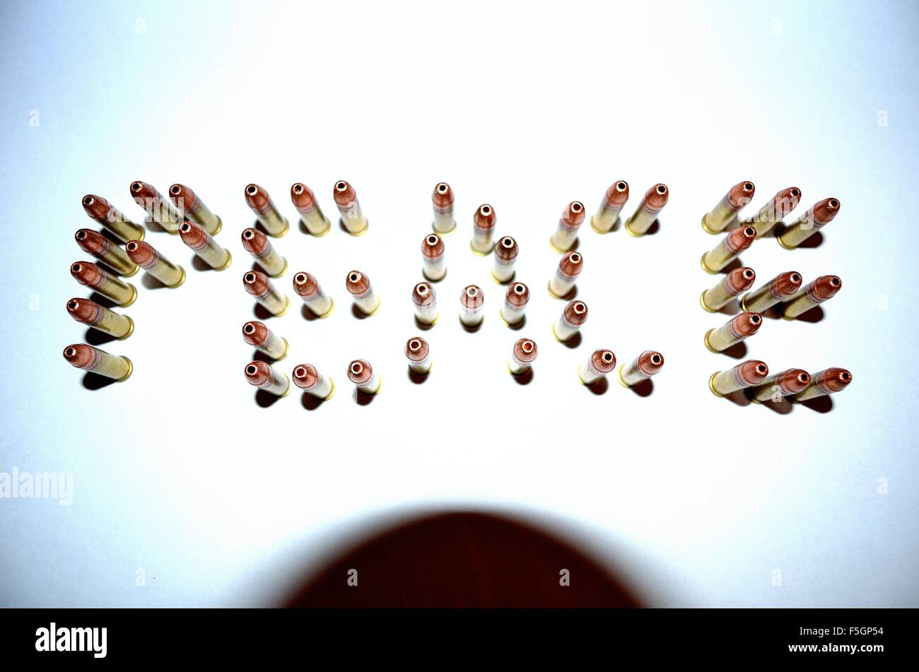 peace written with 22 caliber bullets ammunition Stock Photo - Alamy