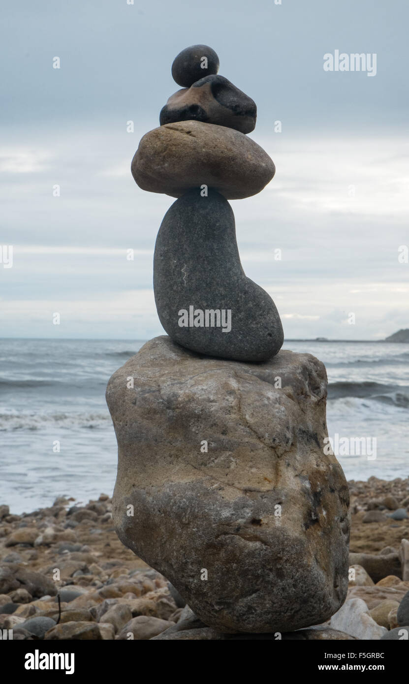 Stone balancing.Pebble sculpture.Jurassic,Coast,UNESCO,Dorset,Charmouth ...
