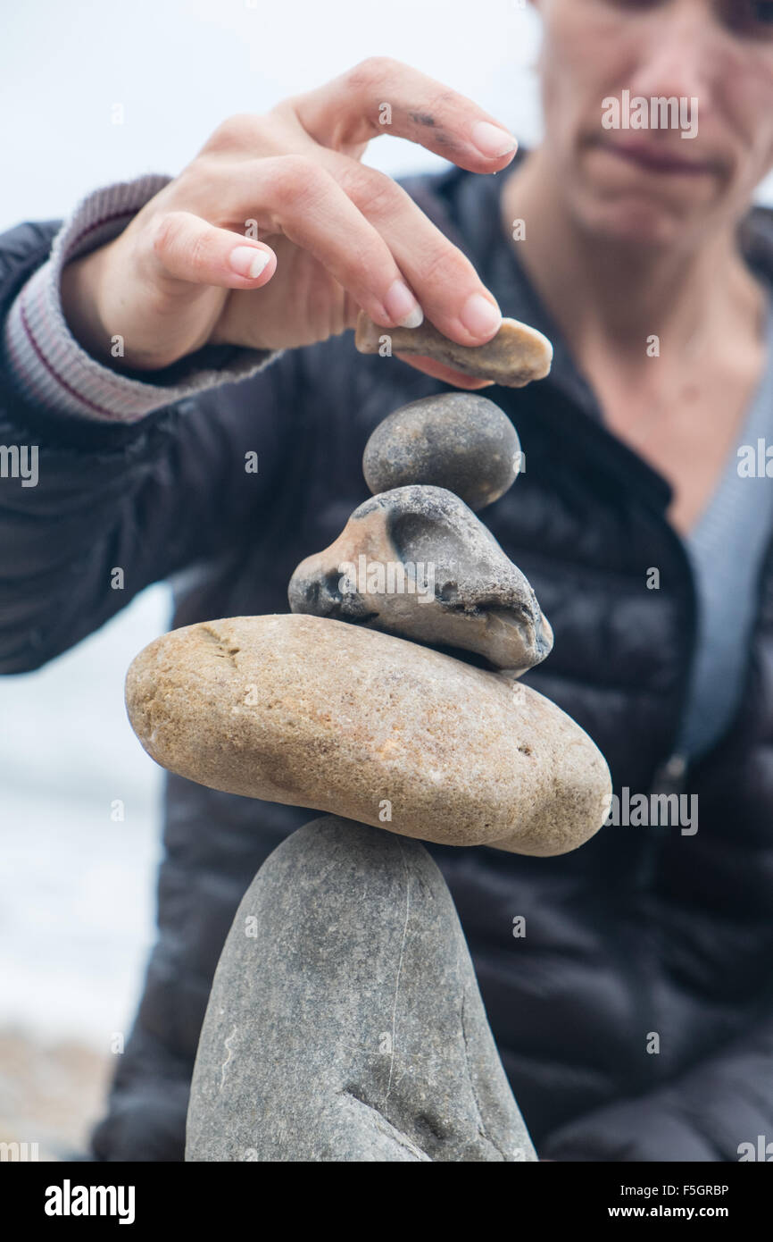 Stone balancing.Pebble sculpture.Jurassic,Coast,UNESCO,Dorset,Charmouth ...