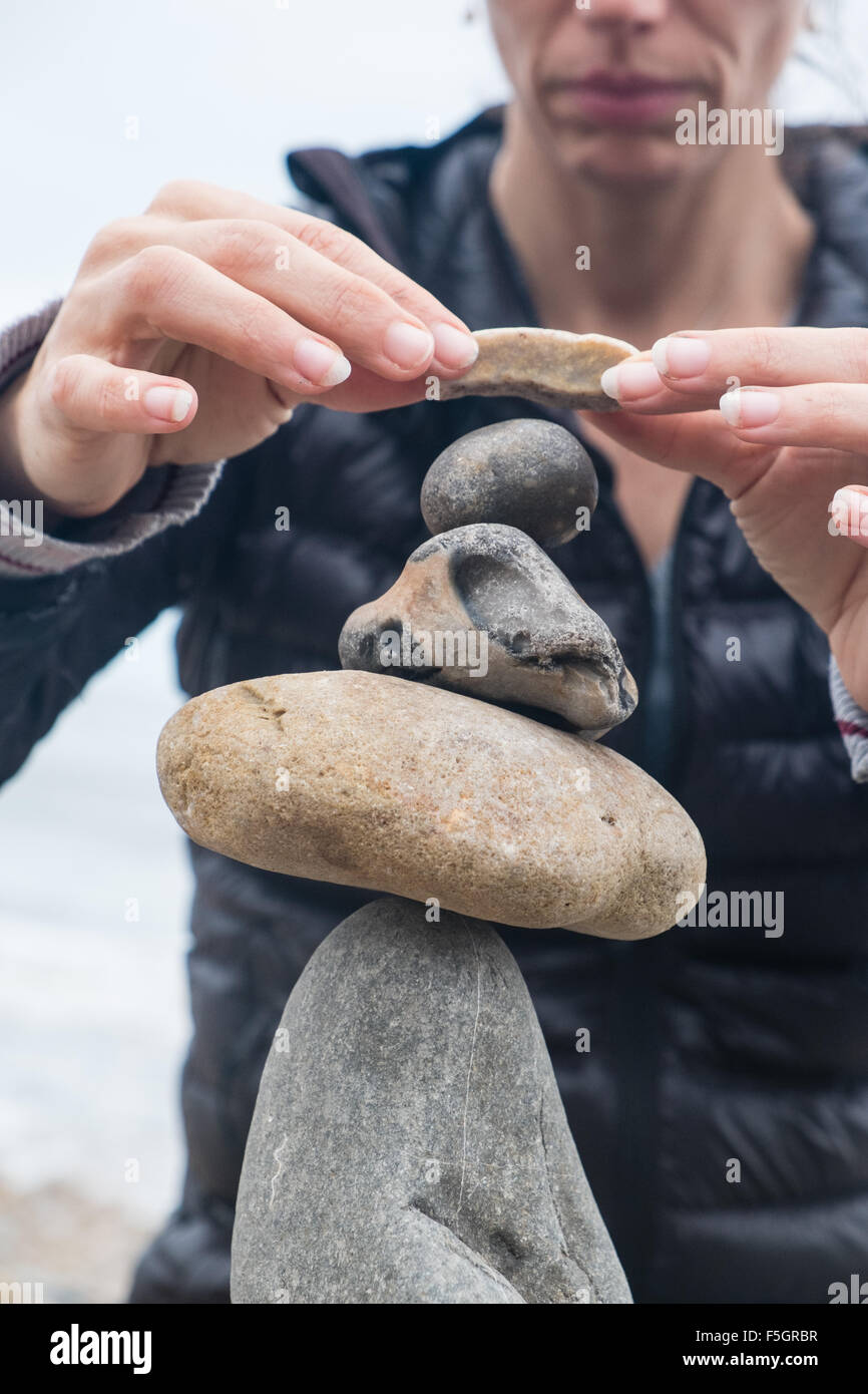 Stone balancing.Pebble sculpture.Jurassic,Coast,UNESCO,Dorset,Charmouth ...