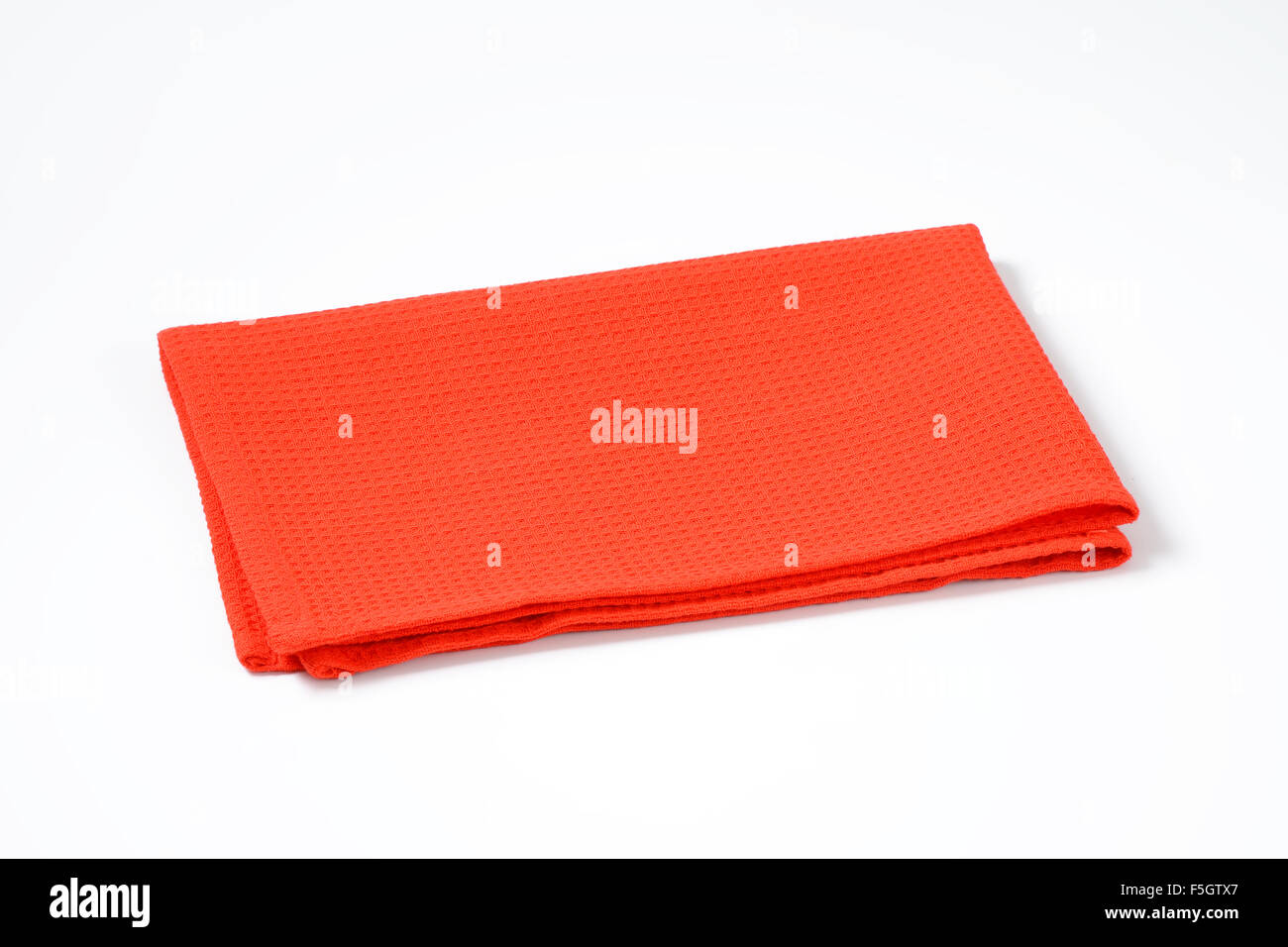 red place mat on white background Stock Photo - Alamy