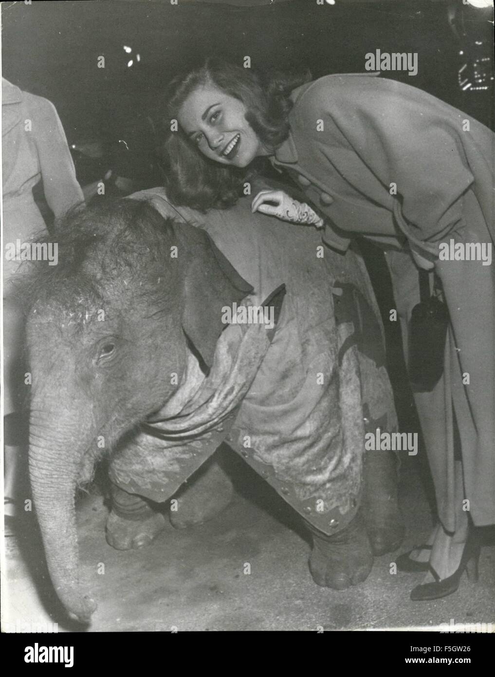 1945 - Judy, the club dancing elephant, is being admired by film star ...