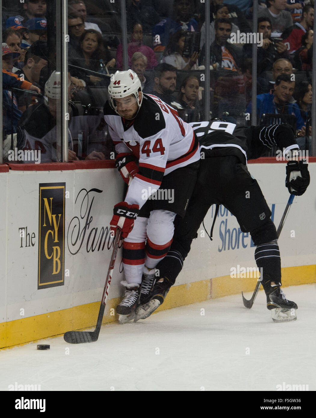 New York, NY, USA. 3rd Nov, 2015. New Jersey Devils defenseman ERIC GELINAS (44) and New York ...