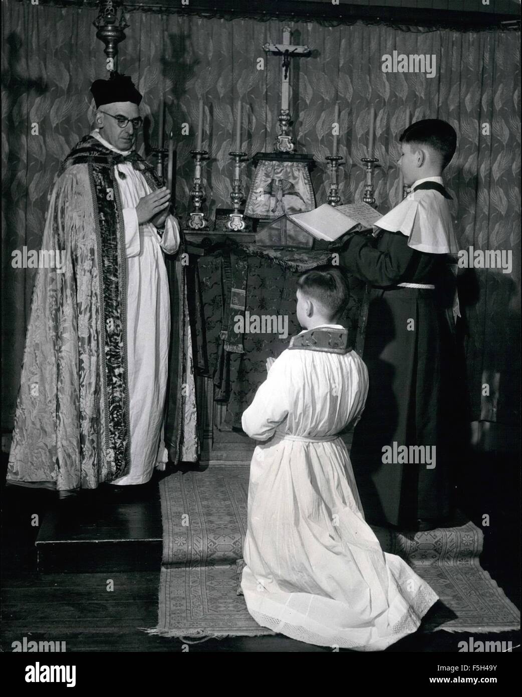1962 - A Boy Becomes A Bishop: Kneeling reverently before the altar, 12 ...