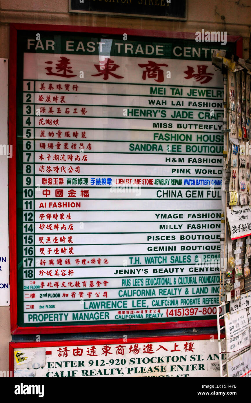 Multi-company sign outside a building in Chinatown in San Francisco ...