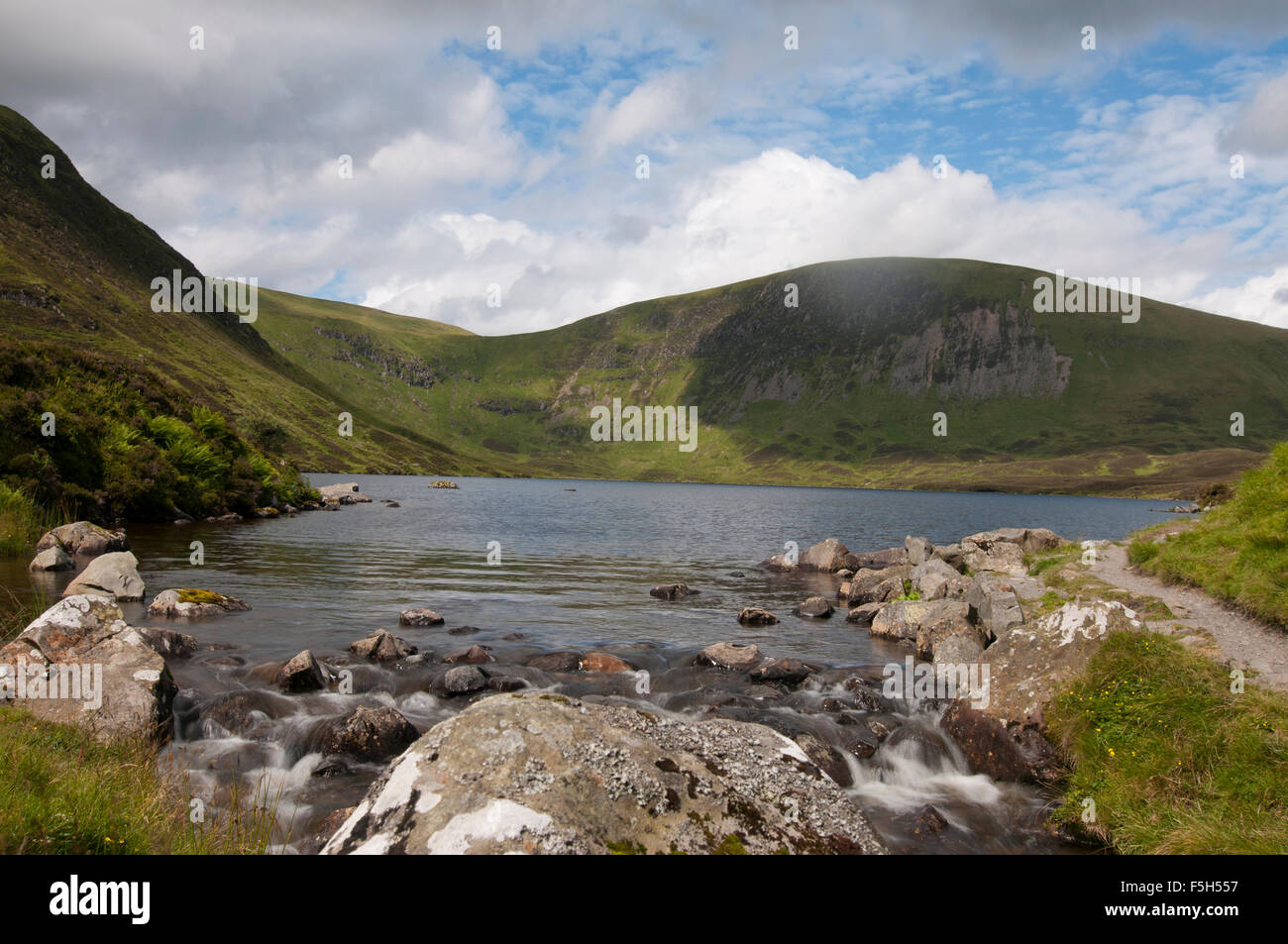 The Tail burn as it leaves Loch Skene, Dumfries and Galloway Stock ...