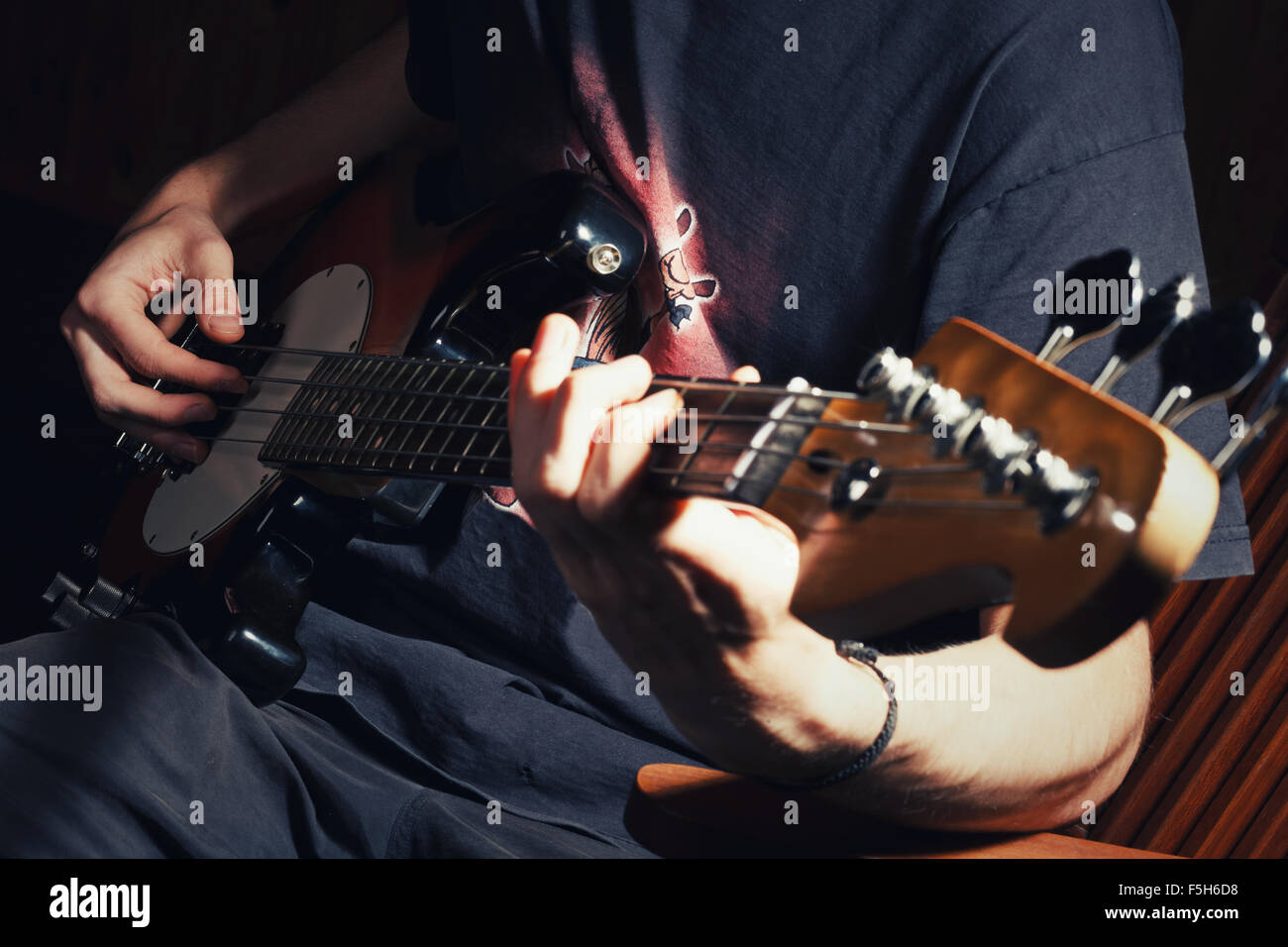 guy playing bass Stock Photo - Alamy