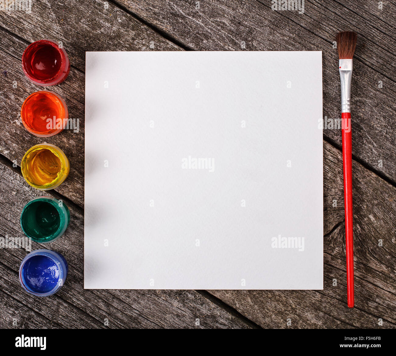 paints for painting and brush with blank white paper sheet Stock Photo ...