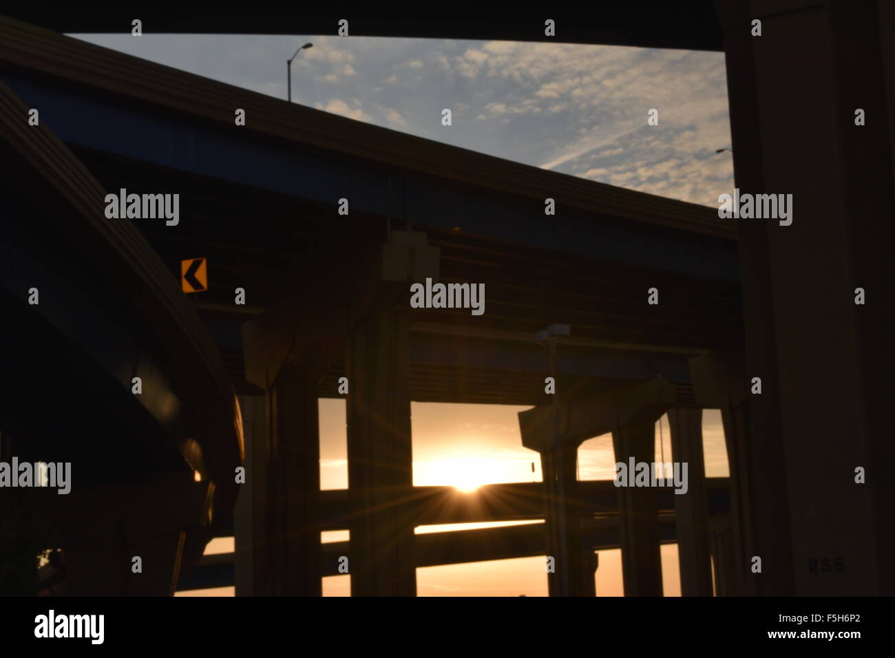 Cars drive under highway hi-res stock photography and images - Alamy