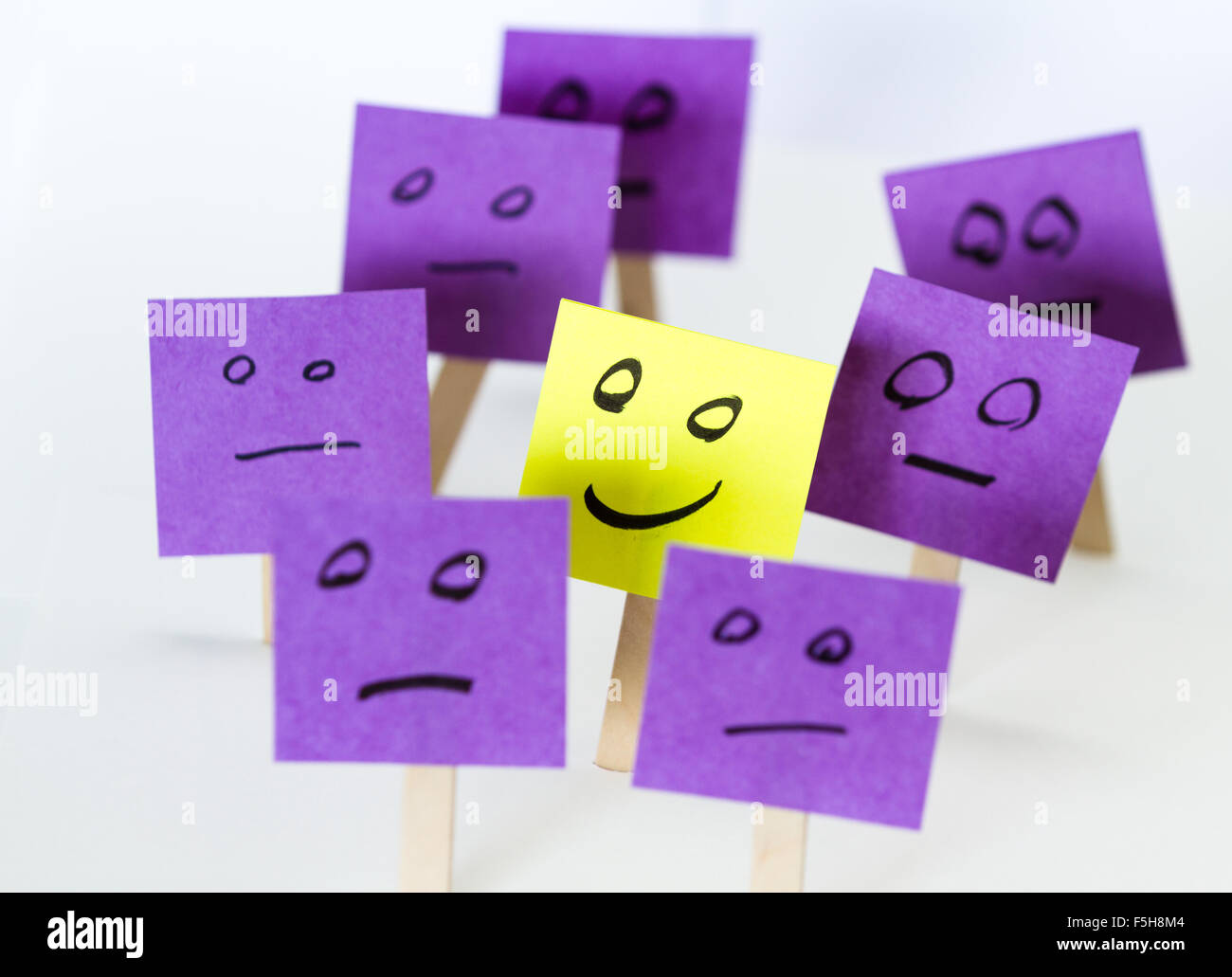 conceptual image for a be different or be happy concept using sticky ...