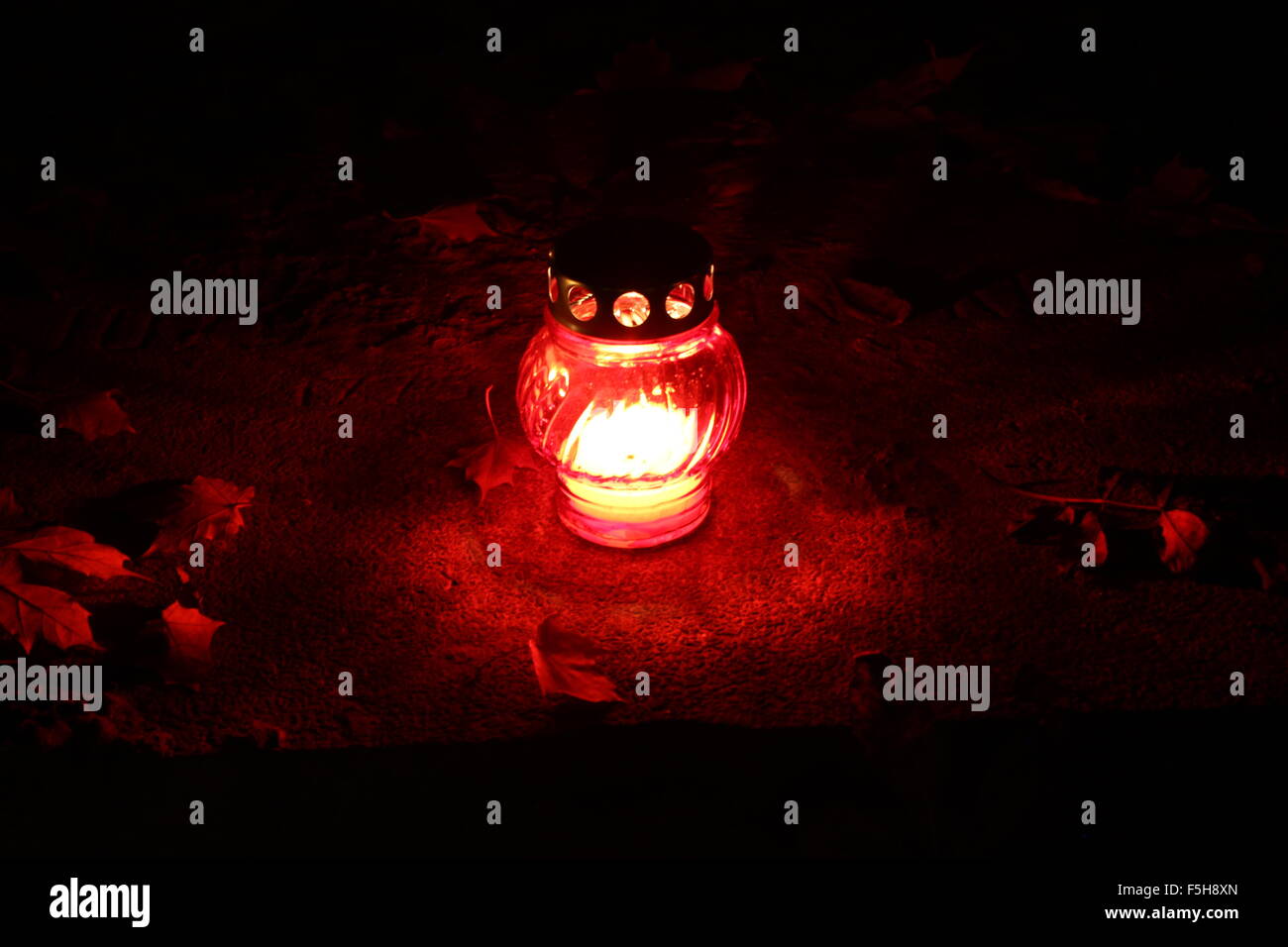 Red light surrounded by darkness Stock Photo - Alamy