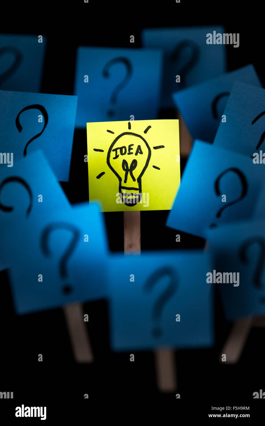 conceptual image for a good idea hand drawn on a sticky note with ...