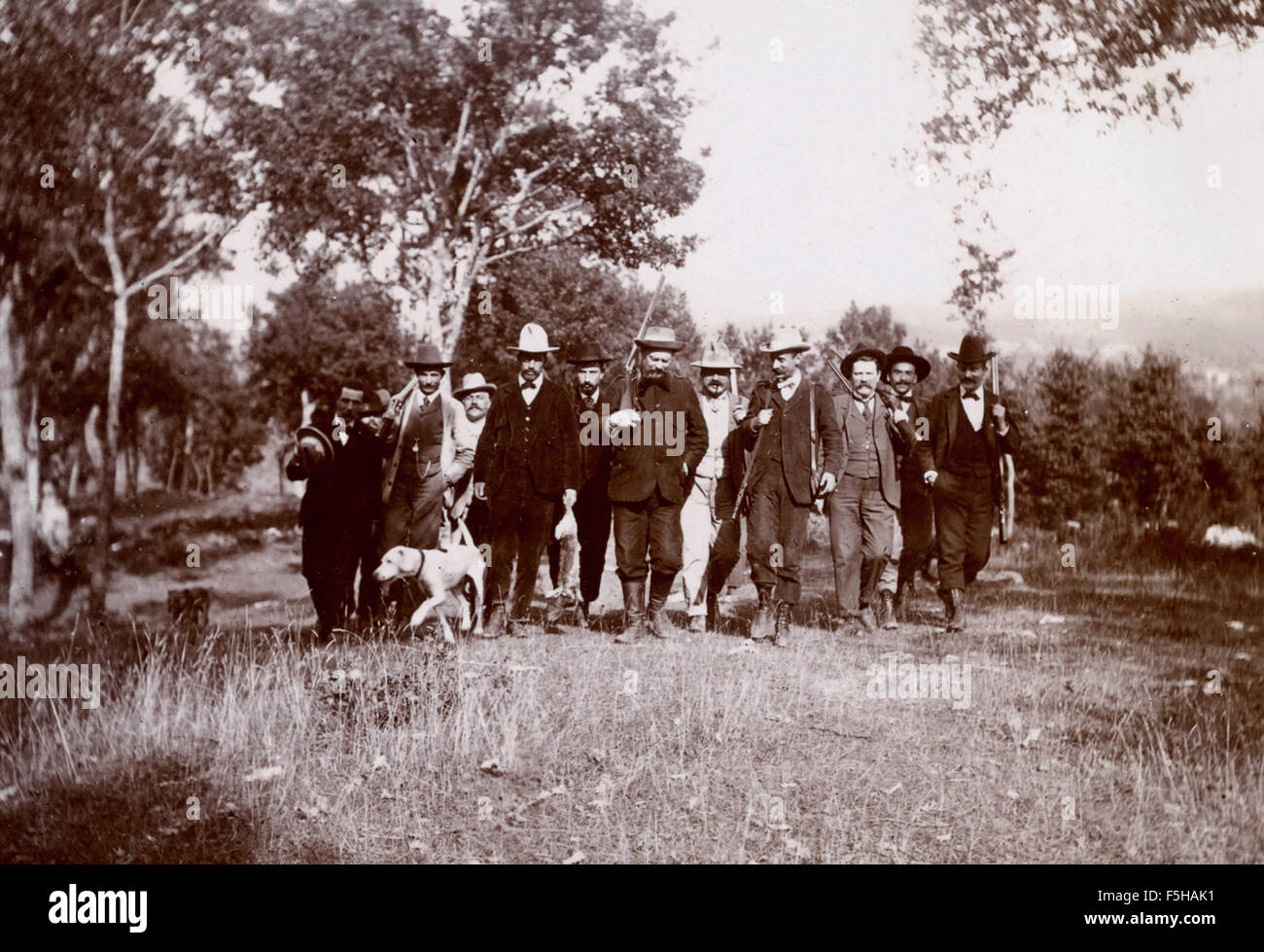 Group of men to hunt, Italy Stock Photo - Alamy