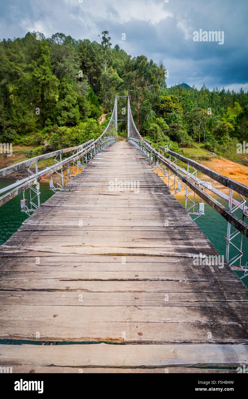 Wooden suspension bridge in Guatape, Colombia Stock Photo - Alamy