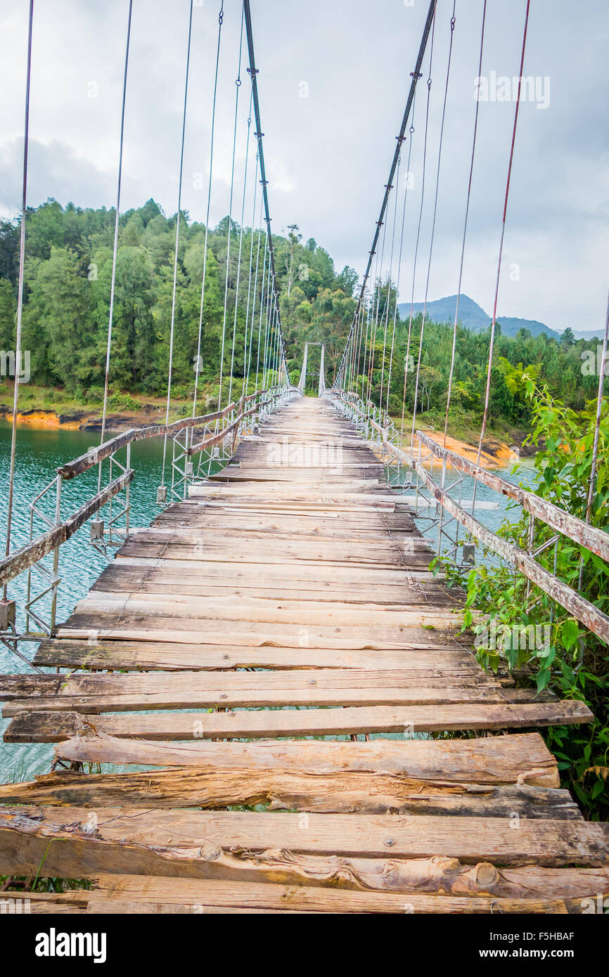 Wooden suspension bridge in Guatape, Colombia Stock Photo - Alamy