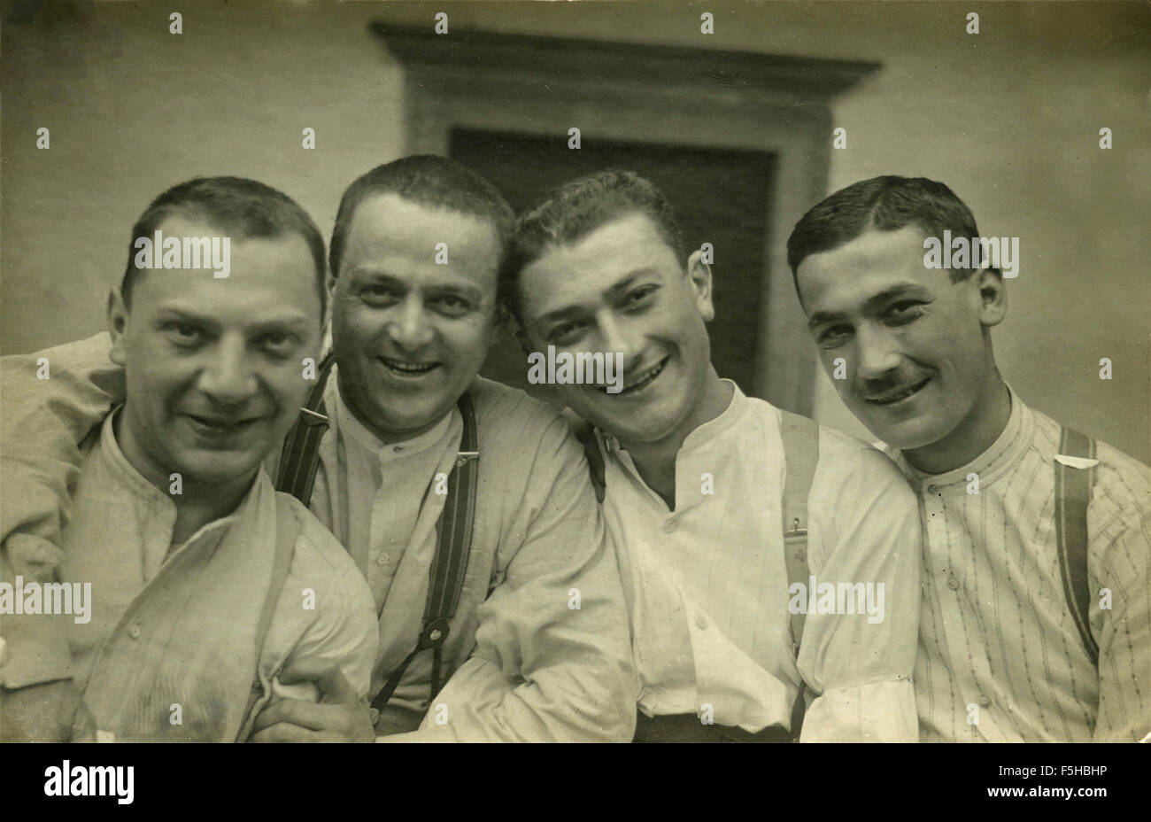 Four friends smiling, Italy Stock Photo - Alamy