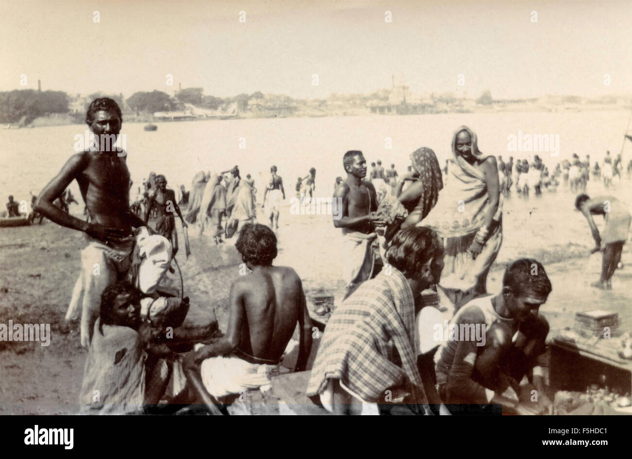 Group of Indians in activities on the river, India Stock Photo - Alamy