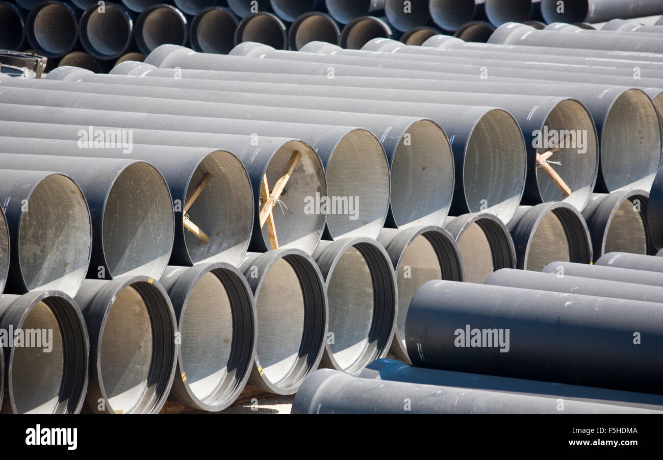 Stacked steel pipes Stock Photo - Alamy