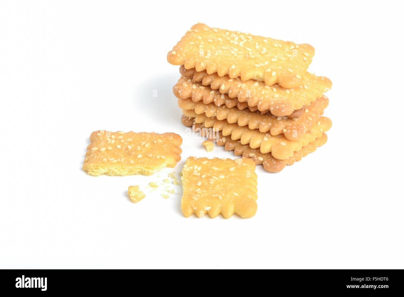 Biscuits pile on white background Stock Photo - Alamy