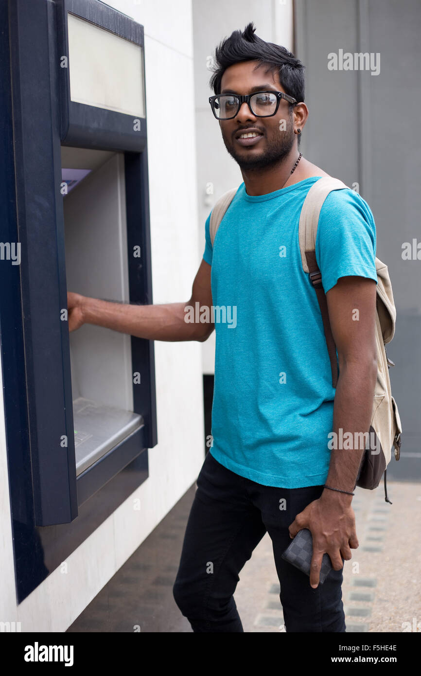 Male withdrawing cash at atm hi-res stock photography and images - Alamy
