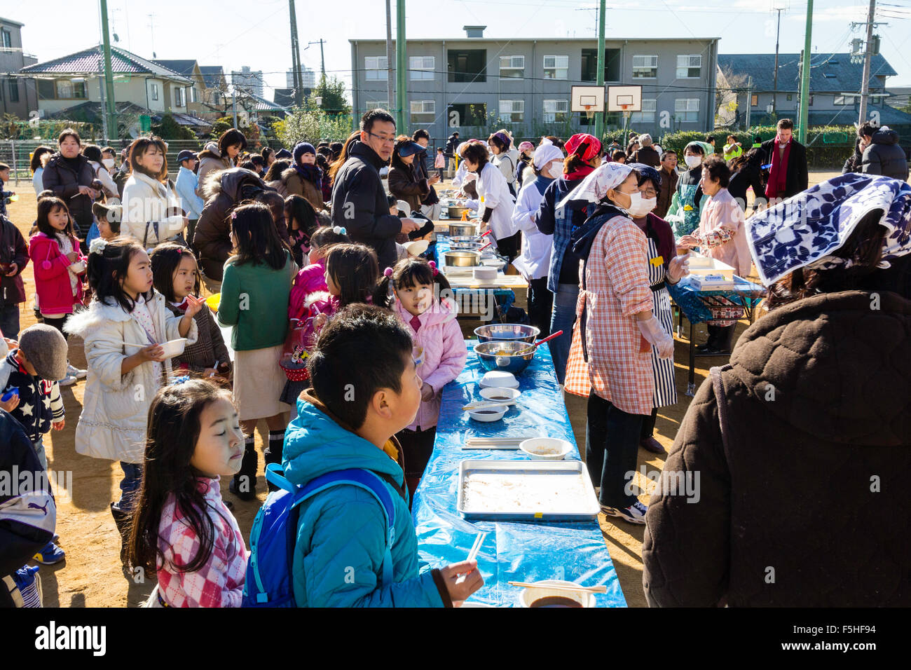 Japan. Omochi, winter rice bashing festival held at local school. In ...