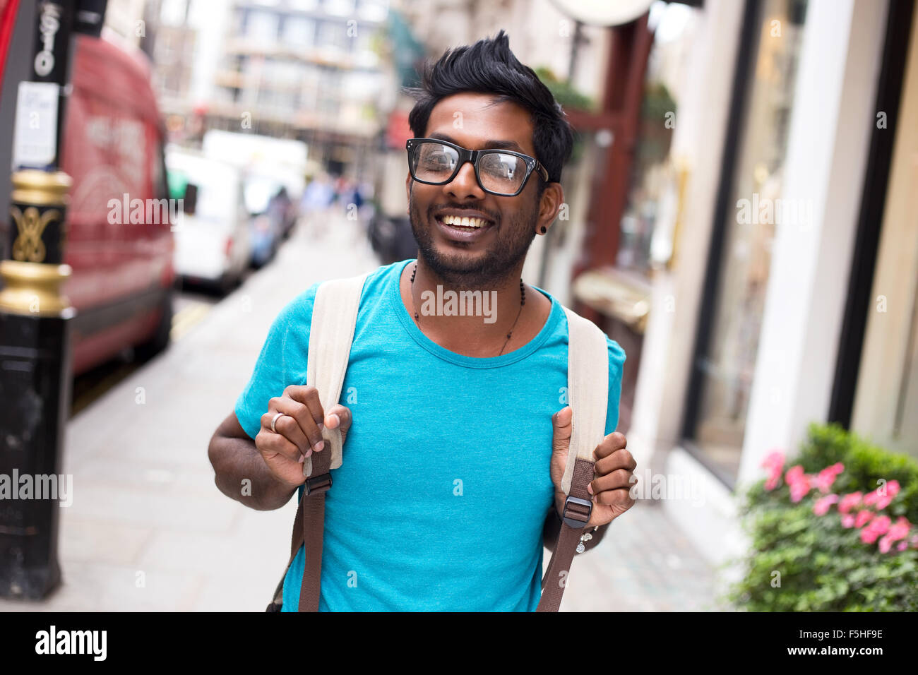 happy indian man in the street Stock Photo - Alamy