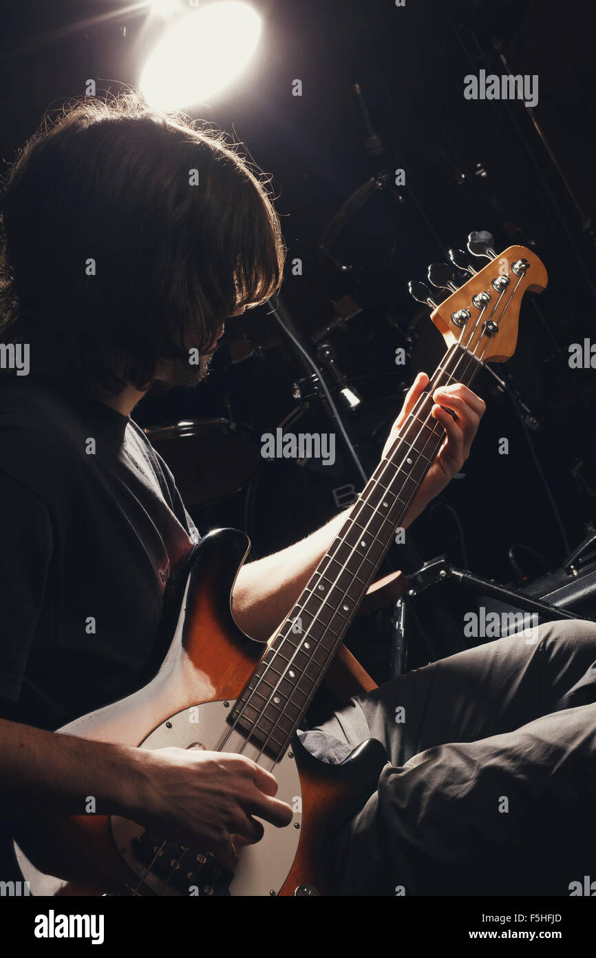 guy playing bass guitar Stock Photo - Alamy