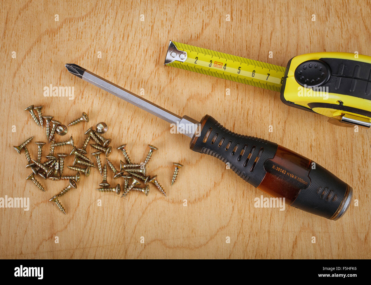 Screws and screwdriver Stock Photo - Alamy