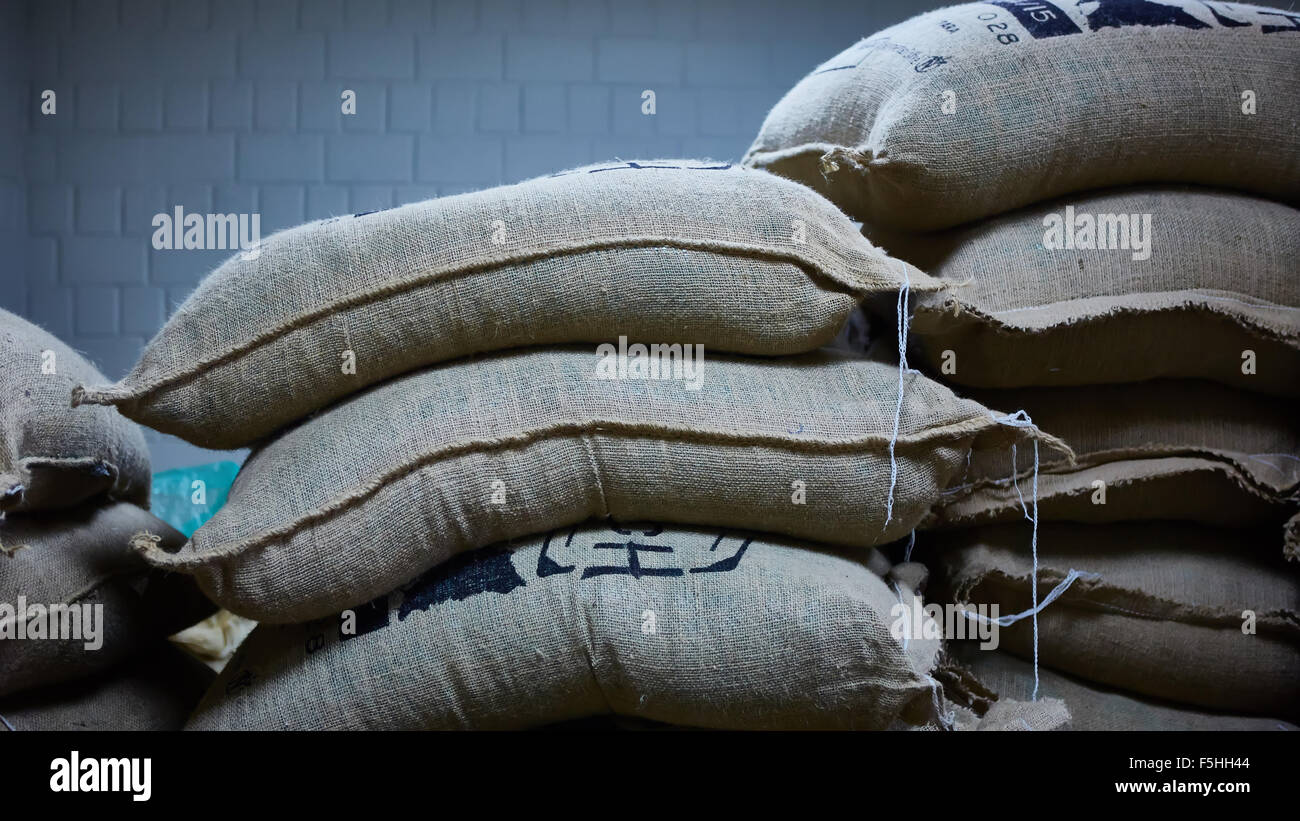 stack of burlap sacks with coffee beans Stock Photo - Alamy