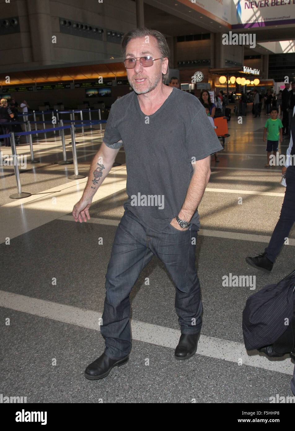 Tim Roth arriving at Los Angeles International Airport (LAX) to catch a ...