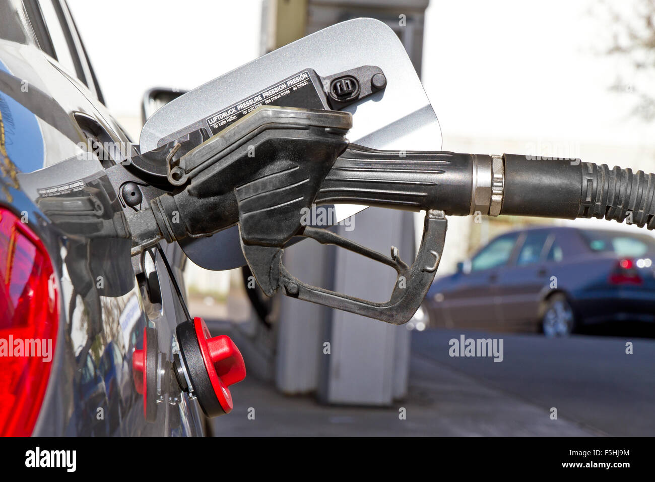 Man fuel nozzle hi-res stock photography and images - Alamy