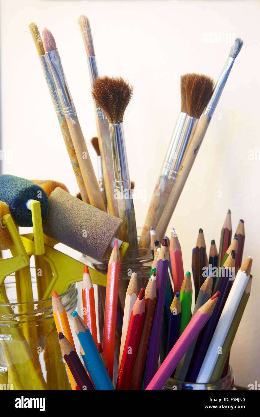 Group of school art craft tools multi colored vertical Stock Photo - Alamy
