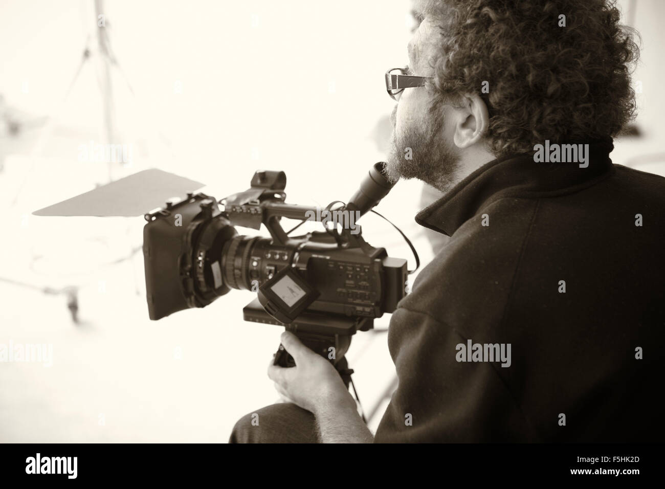 Camera operator with digital video camera black and white Stock Photo ...