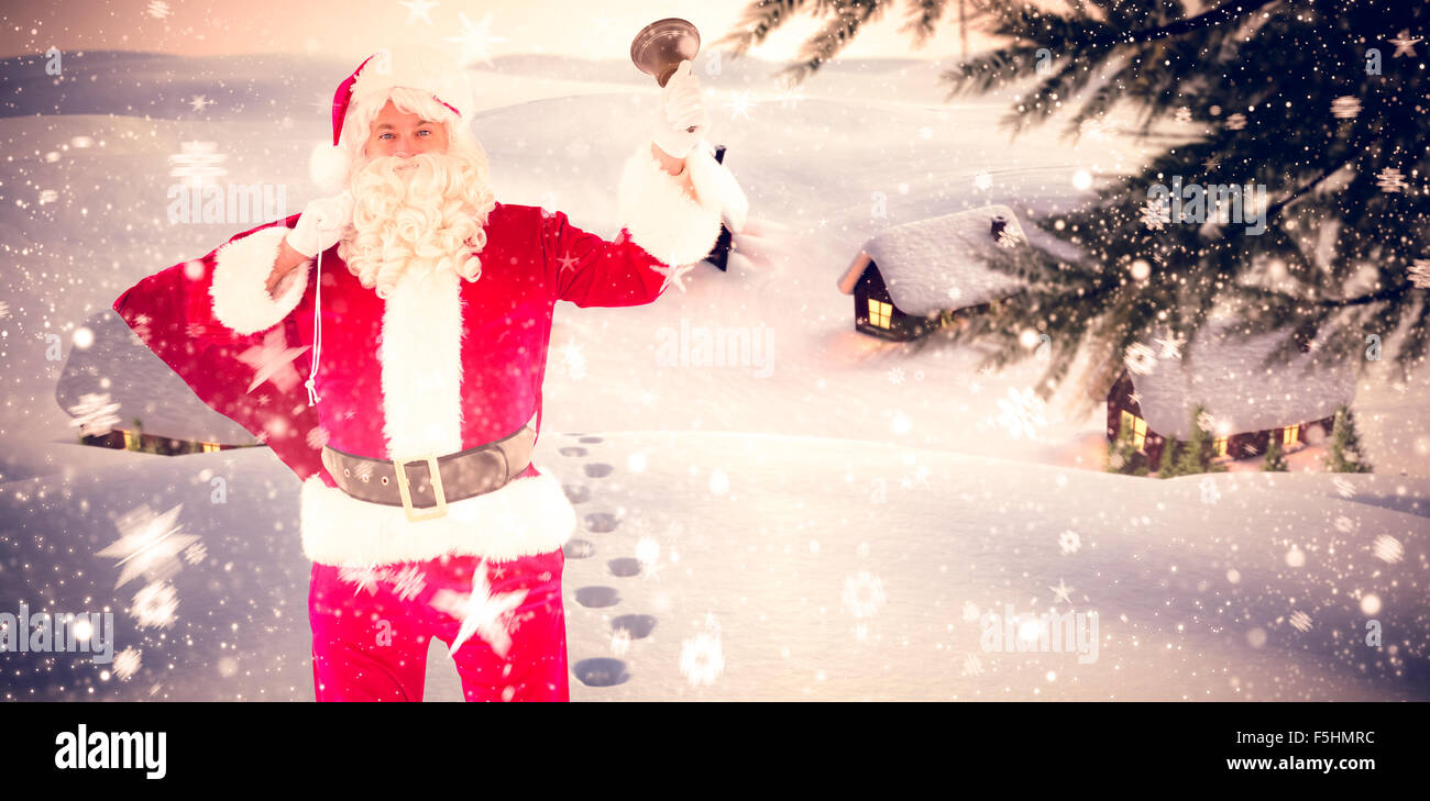 Composite image of santa claus holding a sack and bell Stock Photo - Alamy
