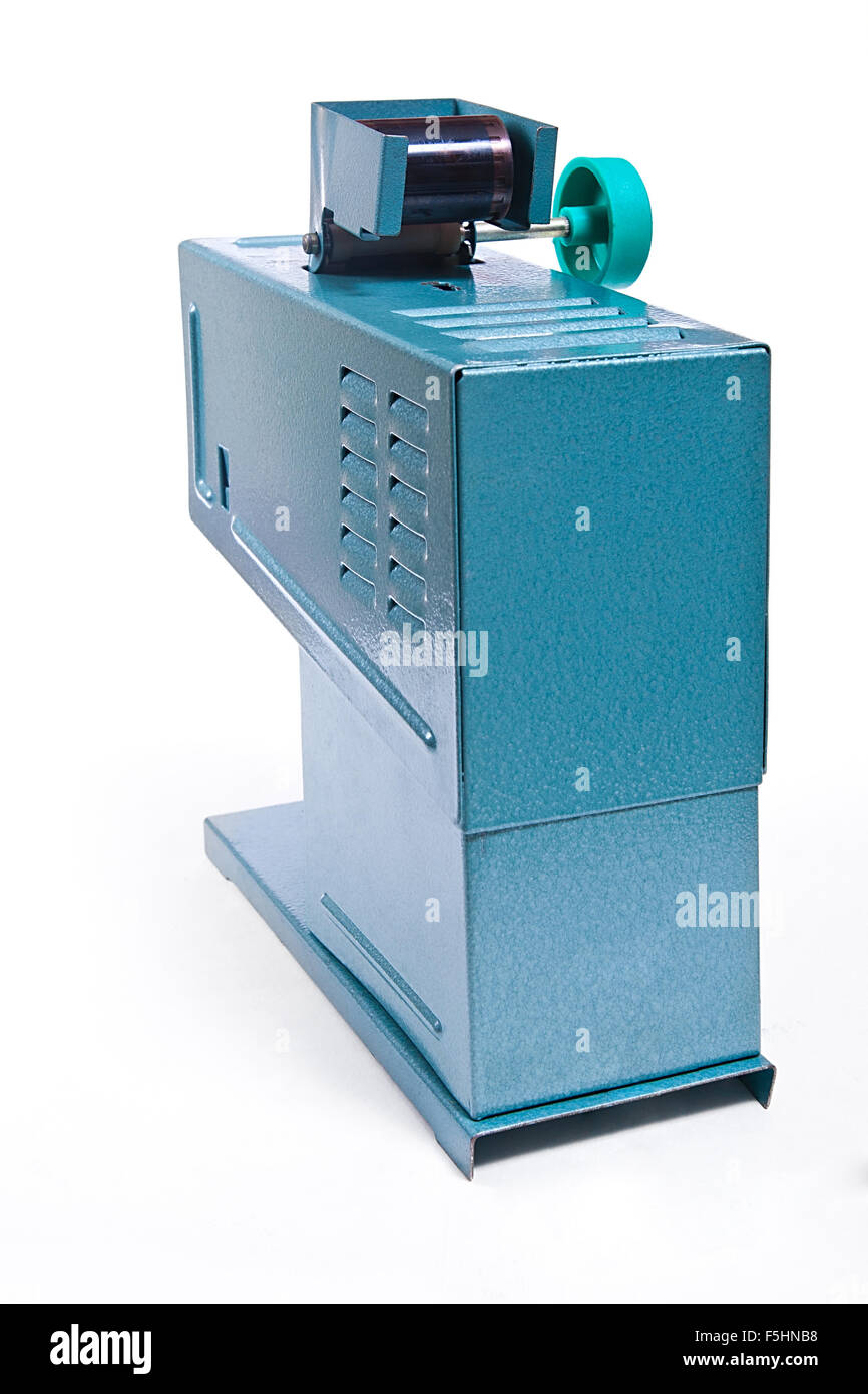 Back view of the vintage filmstrip projector on the white background ...