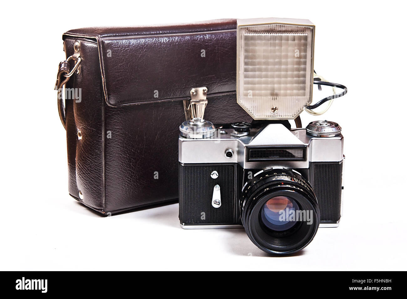Old range finder vintage photo camera with flash isolated on white. Old ...
