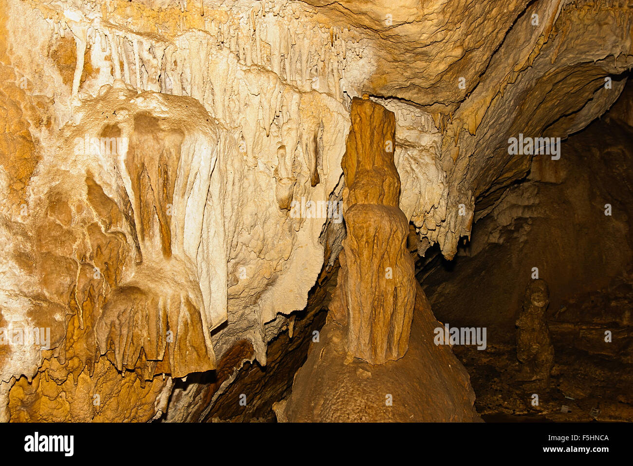 Inside view of an underground cavern or cave with stalagmites and ...